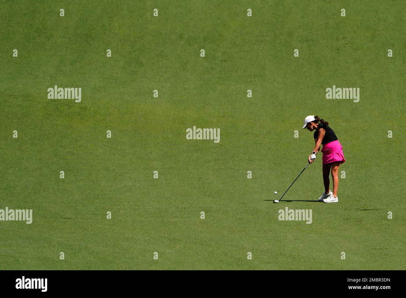 Hailey Borja hits from the fairway on the 10th hole during the final ...