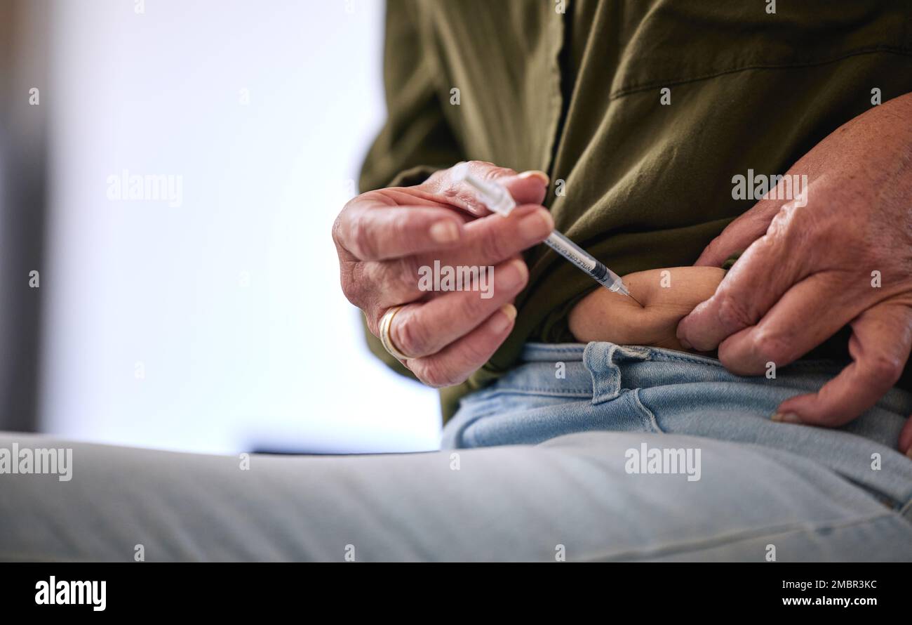 Stomach injection, medicine and needle with hand holding vaccine of ...