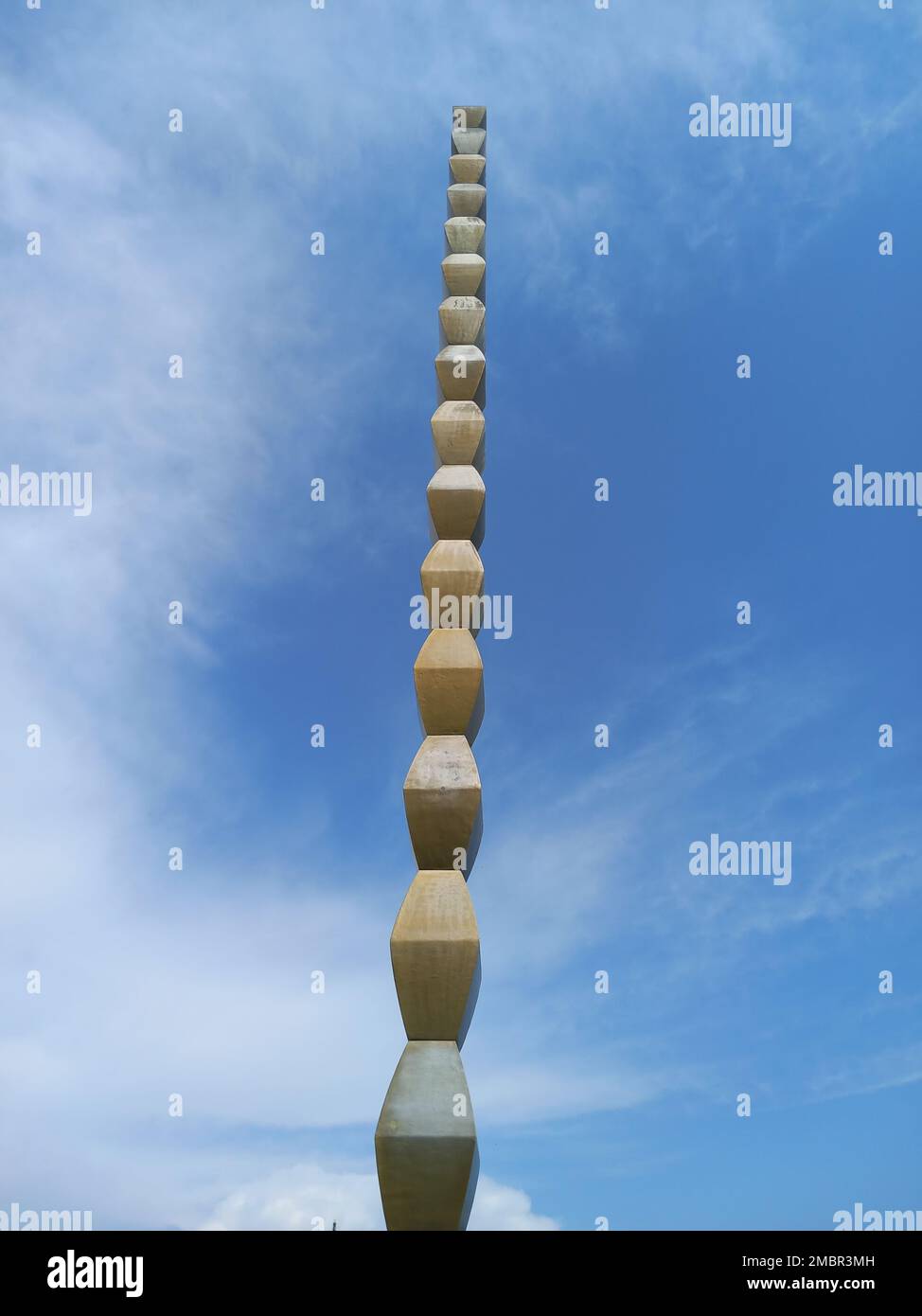 A low angle shot of Infinity Column monument against blue sky in ...