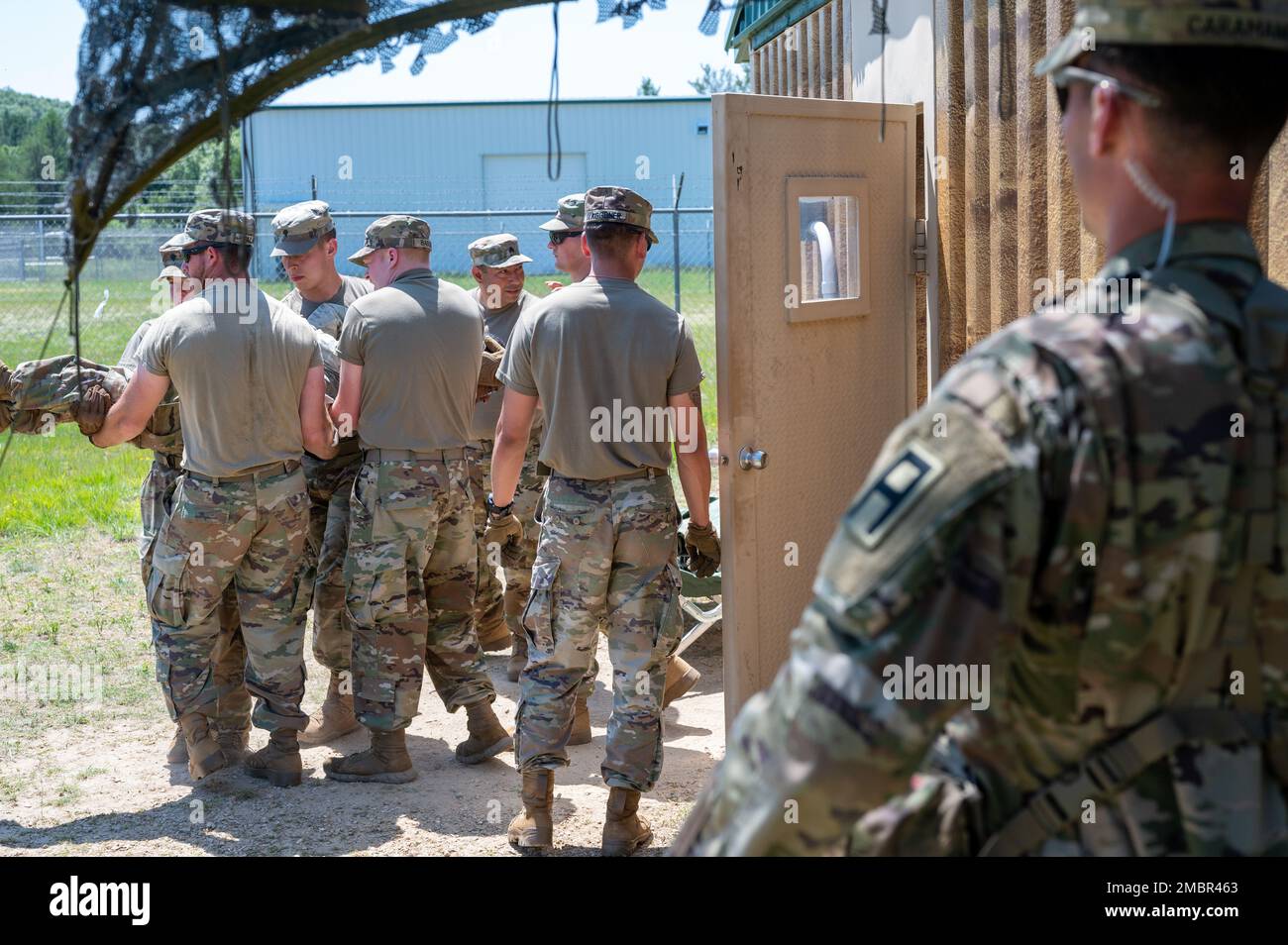 Staff Sgt. Adam Caramanoff, an observer coach/trainer for 3rd Brigade ...