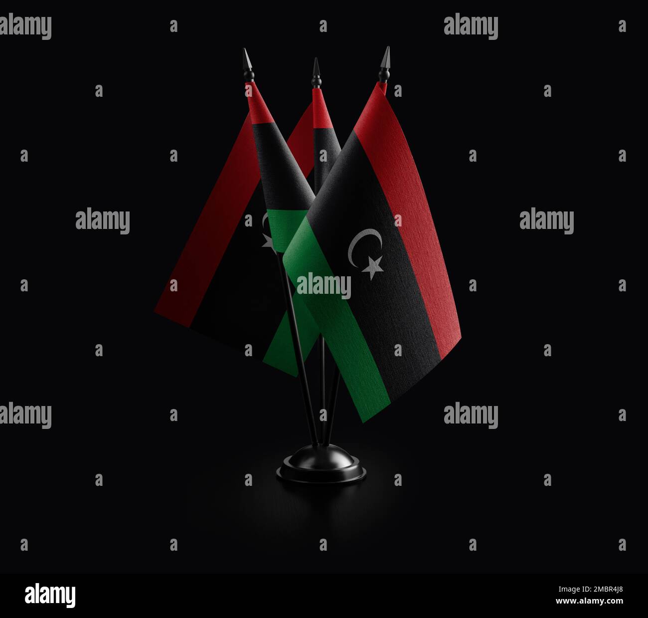 Small national flags of the Libya on a black background Stock Photo - Alamy