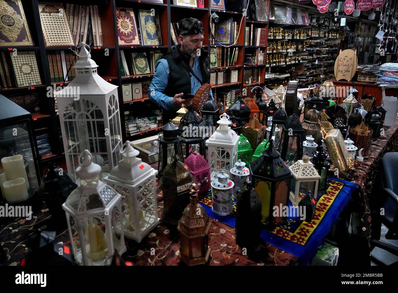 A man shops traditional lanterns for the Muslim holy month of Ramadan ...
