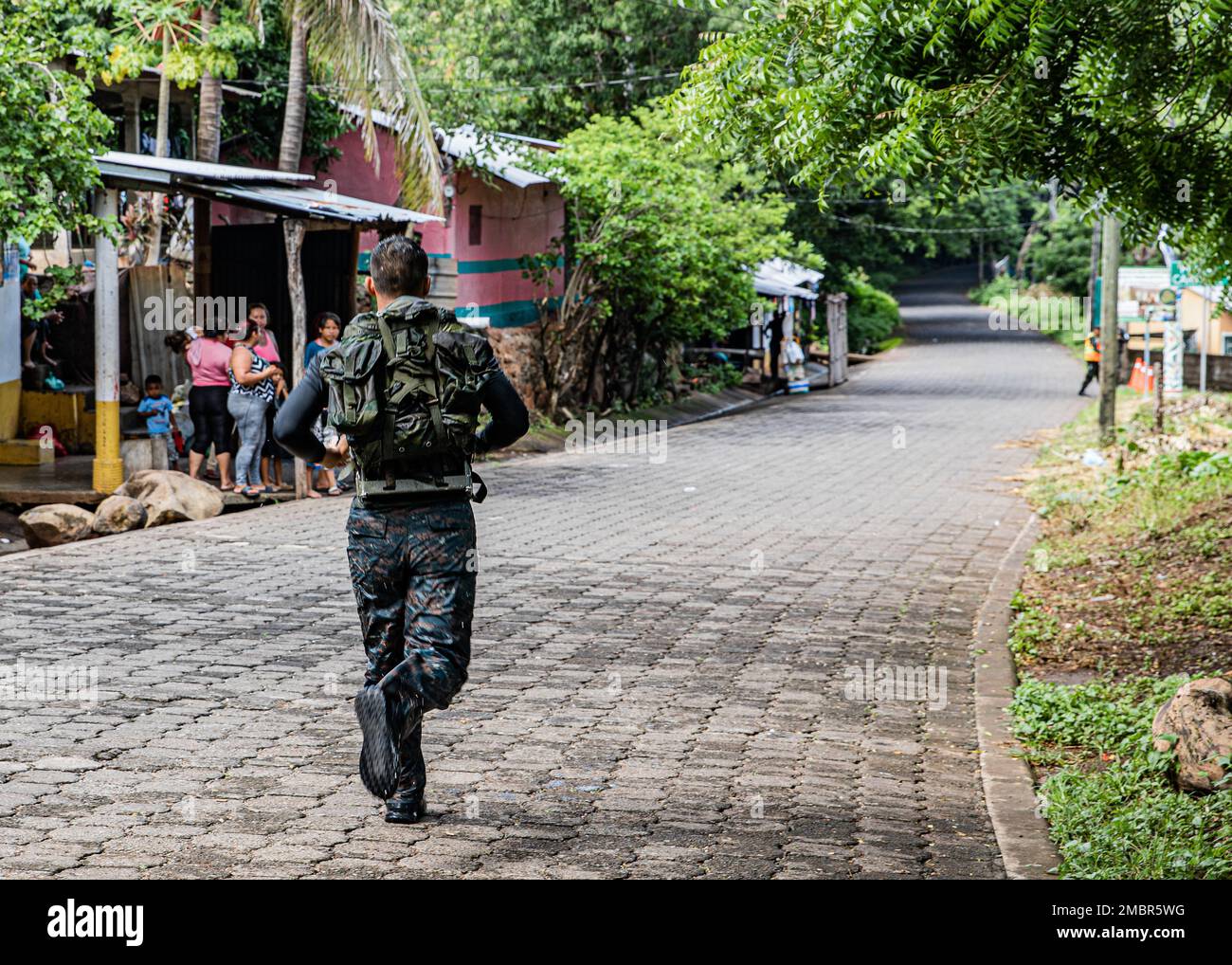 A partner force team member rucks during the water and land course of ...