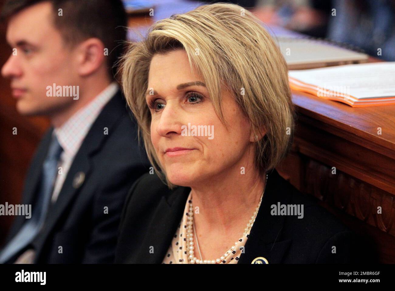 Kansas state Rep. Barbara Wasinger, R-Hays, follows a debate in the ...