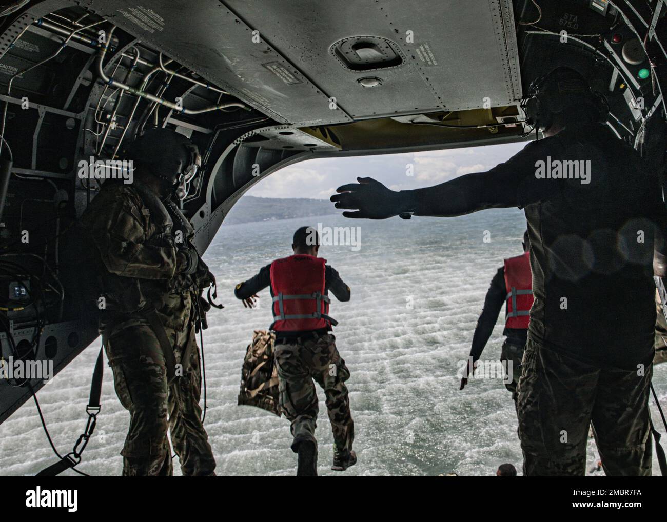 Partner force team members HELOCAST during the water and land course of ...