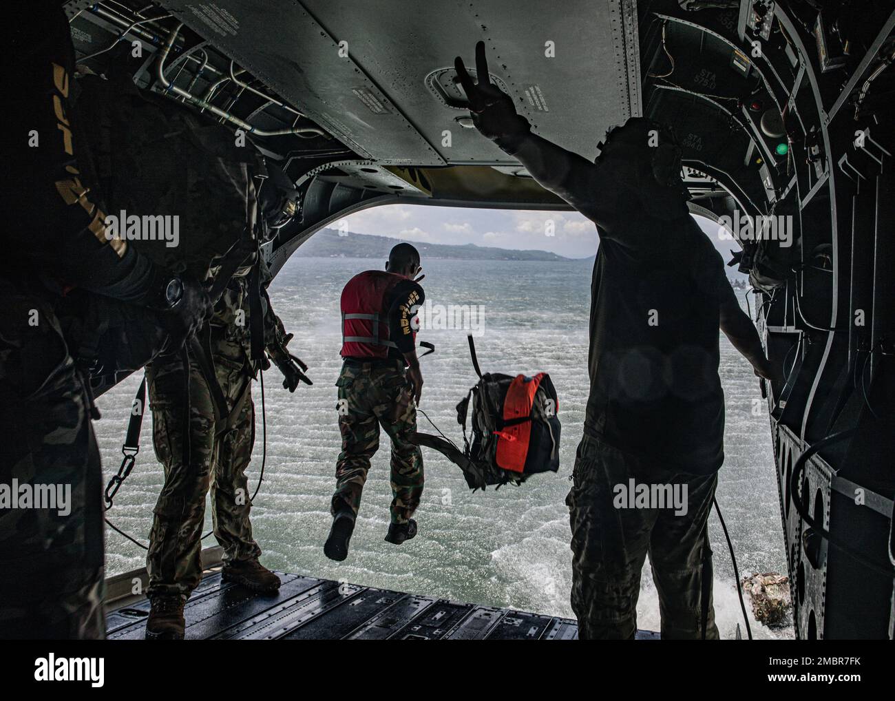 Partner force team members HELOCAST during the water and land course of ...