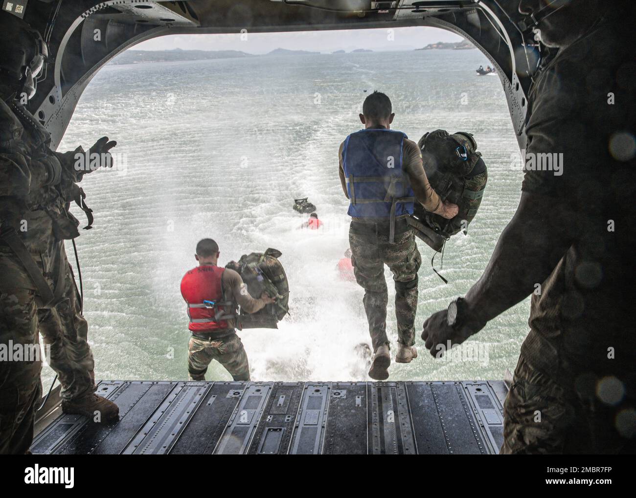 Partner force team members HELOCAST during the water and land course of ...
