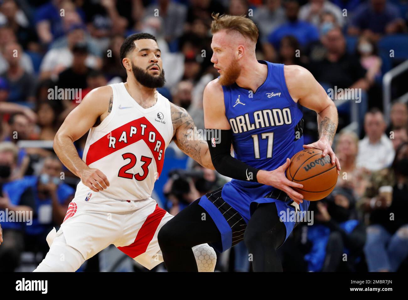 Orlando Magic forward Ignas Brazdeikis (17) drives past Toronto Raptors ...