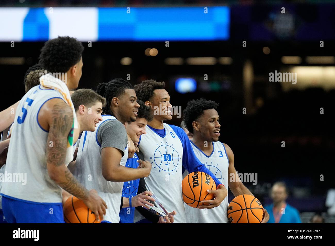 The Duke basketball team poses for a group photo after practice for the ...