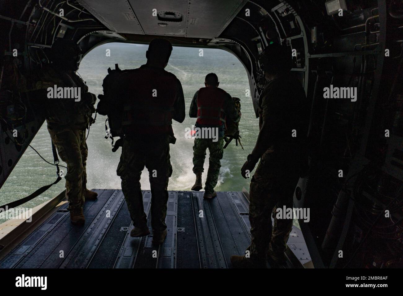 NAVAL BASE AMAPALA, Honduras - Partner Forces jump from a Chinook into ...