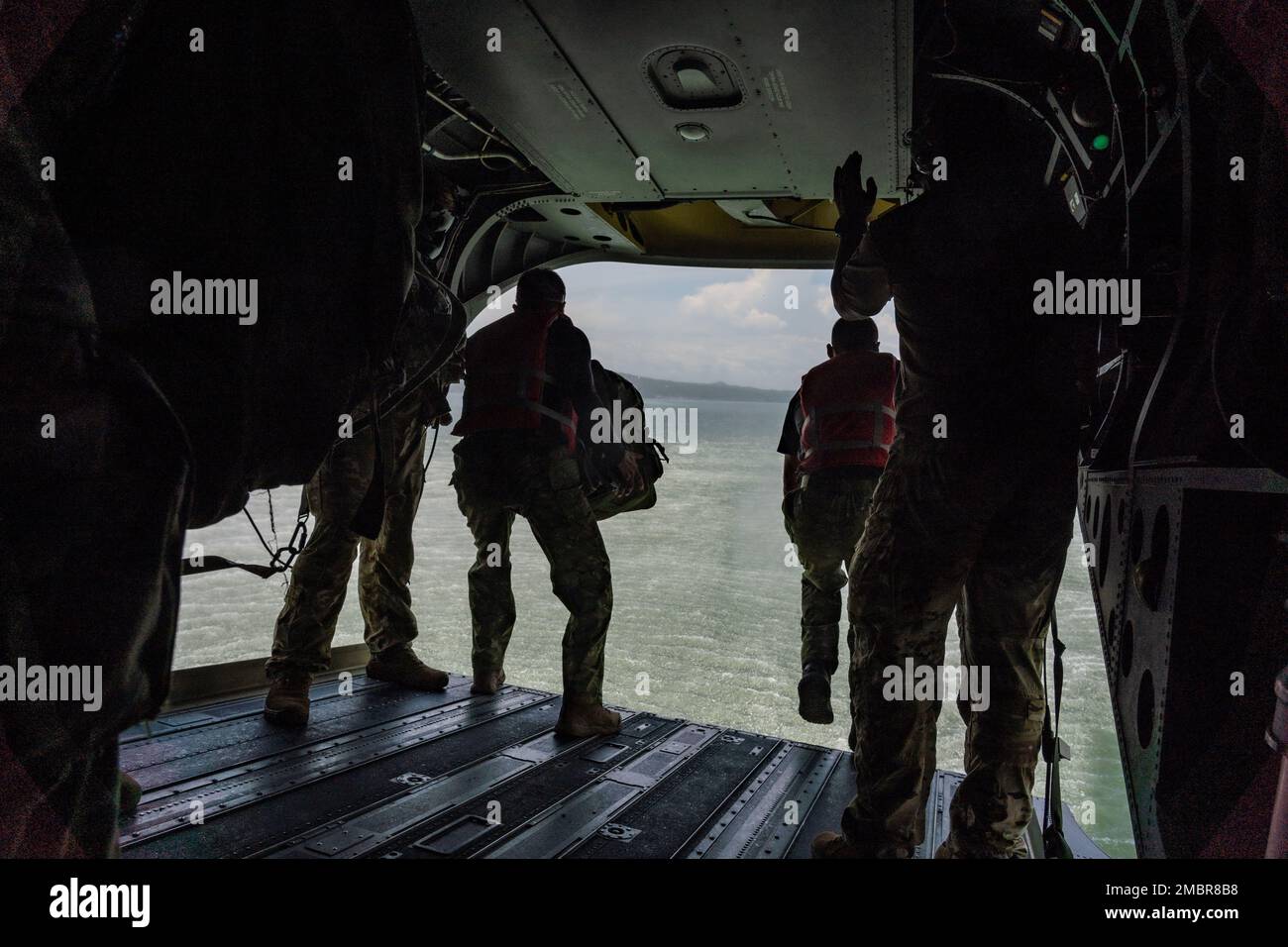 NAVAL BASE AMAPALA, Honduras - Partner Forces jump from a Chinook into ...