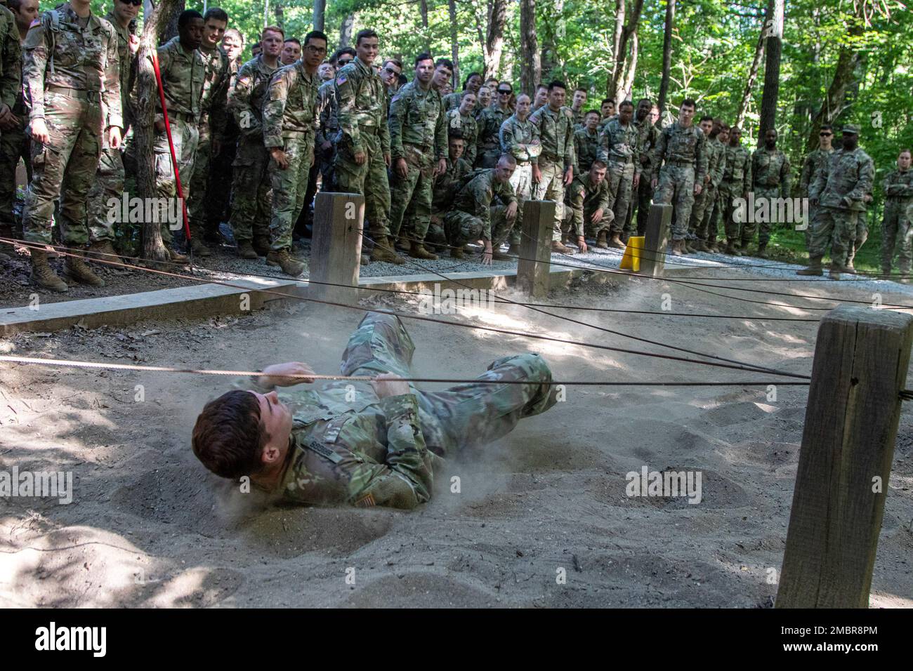 Cadets watch a demonstration of the low wire obstacle on the obstacle ...