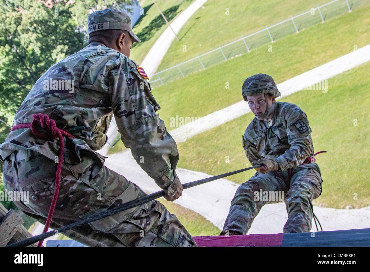 Sgt. Richard Morales, left, a rappel master from the 10th Mountain ...
