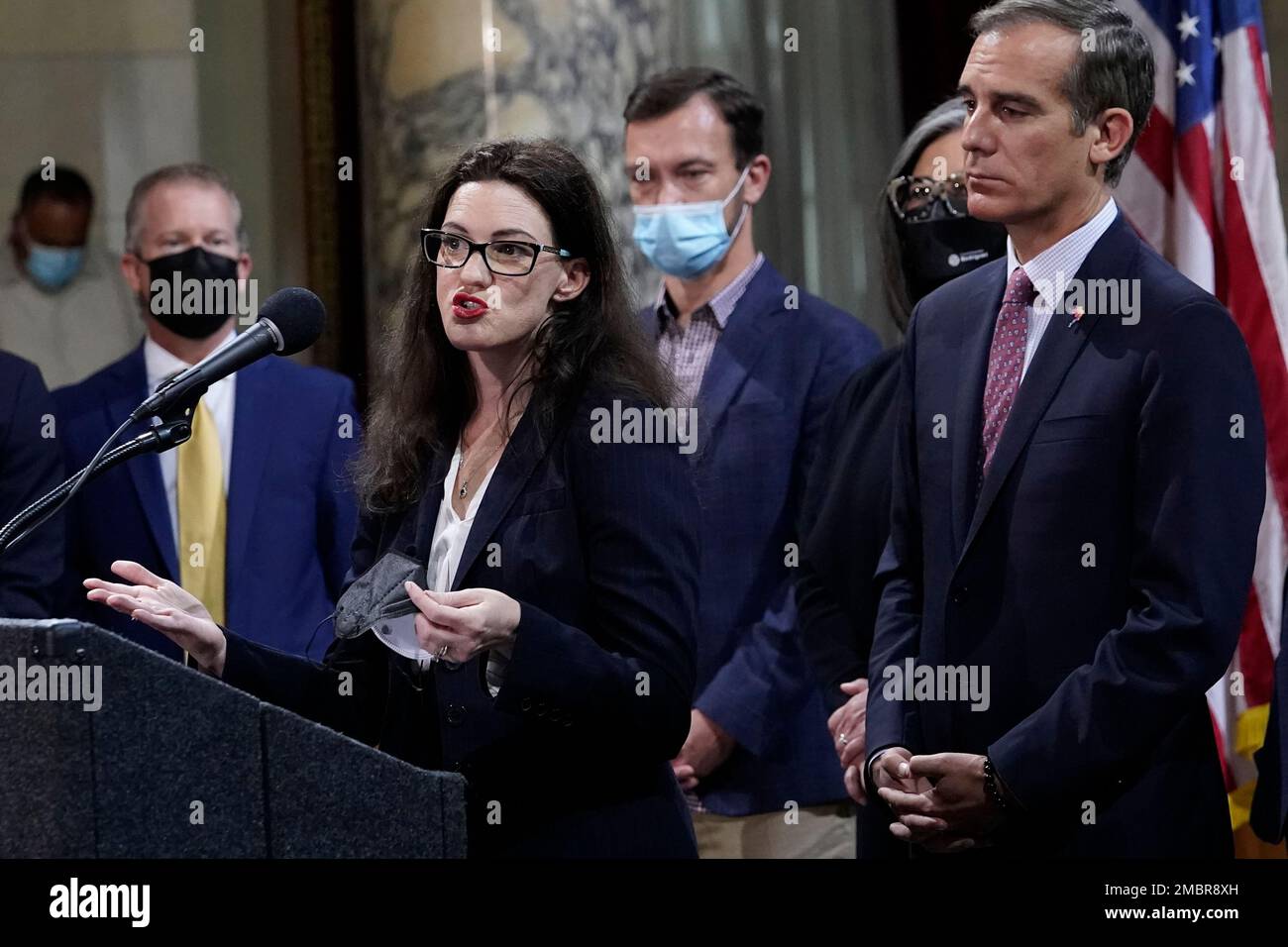 Elizabeth Mitchell, plaintiff attorney for the L.A. Alliance, at podium ...