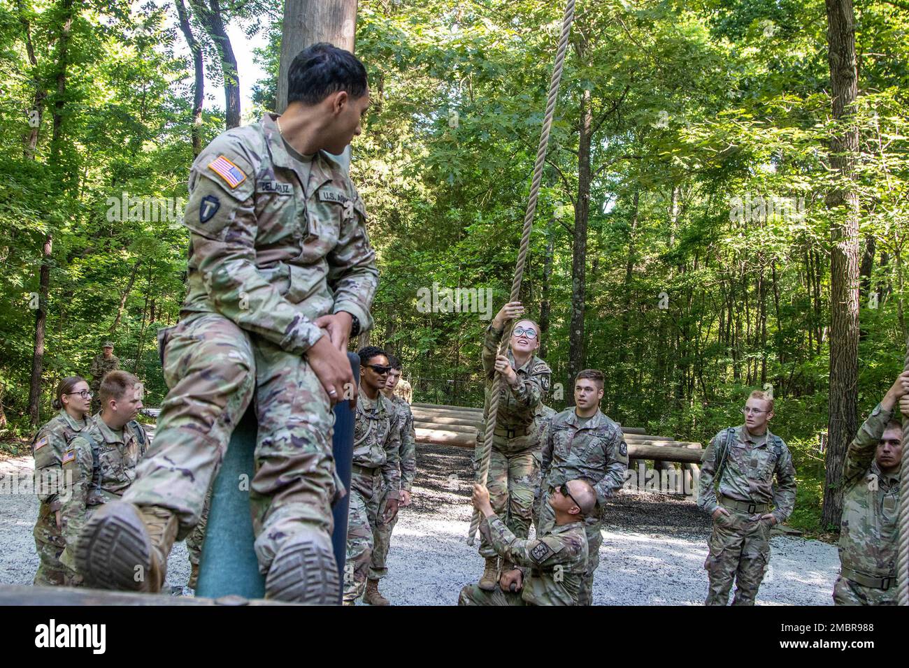 Cadets negotiate the stop, swing and jump obstacle on the obstacle ...