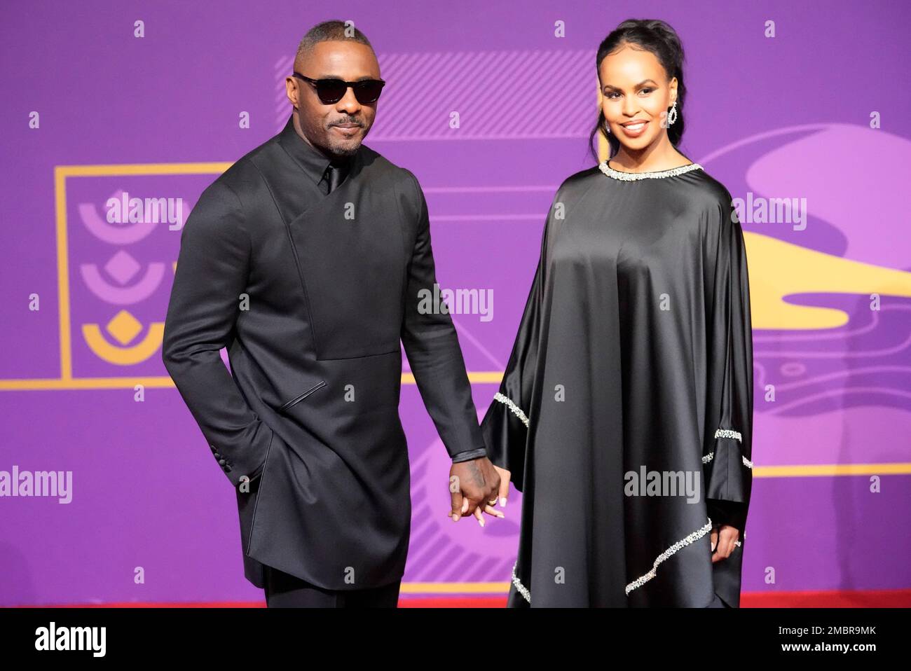Actor and the draw presenter Idris Elba and his wife Sabrina Dhowre ...