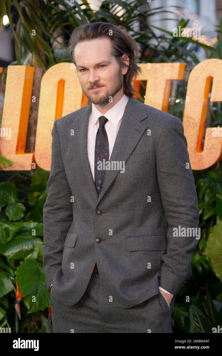Director Adam Nee poses for photographers upon arrival at the premiere ...