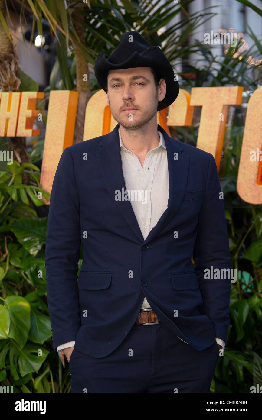 Director Aaron Nee poses for photographers upon arrival at the premiere ...