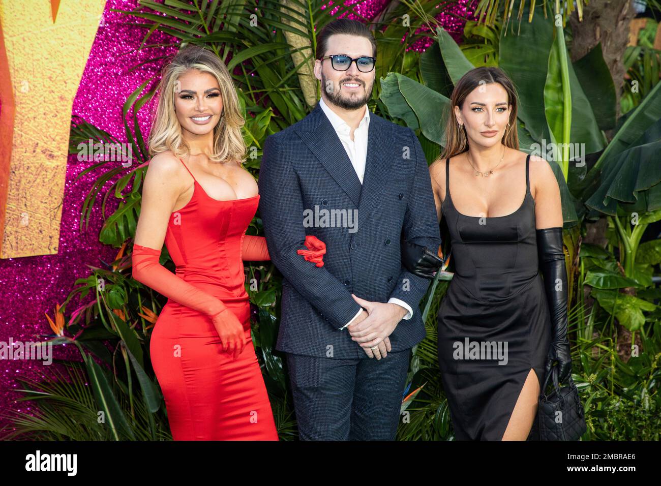 Frankie Sims, Chloe Sims and Charlie Sims pose for photographers upon ...