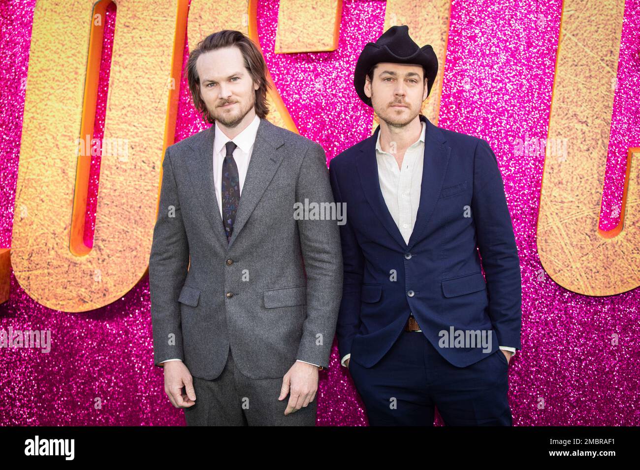 Adam Nee and Aaron Nee pose for photographers upon arrival at the ...