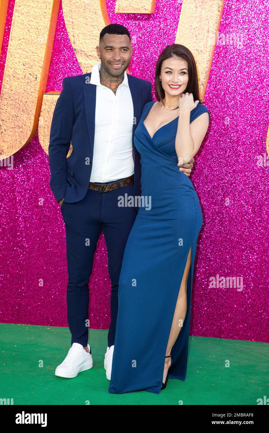 Jermaine Pennant and Jess Impiazzi pose for photographers upon arrival ...