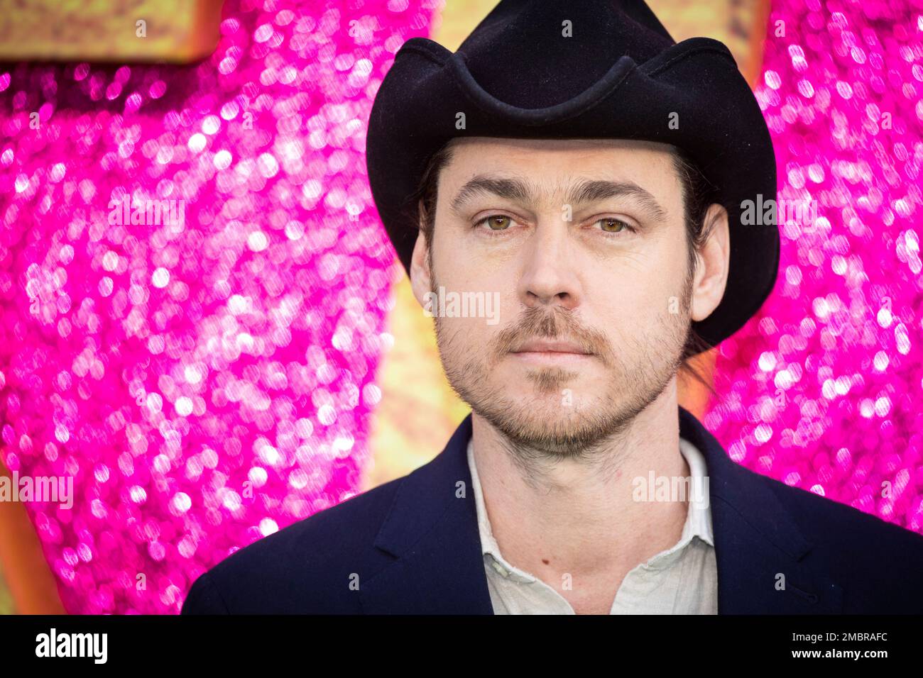 Aaron Nee poses for photographers upon arrival at the premiere of the ...