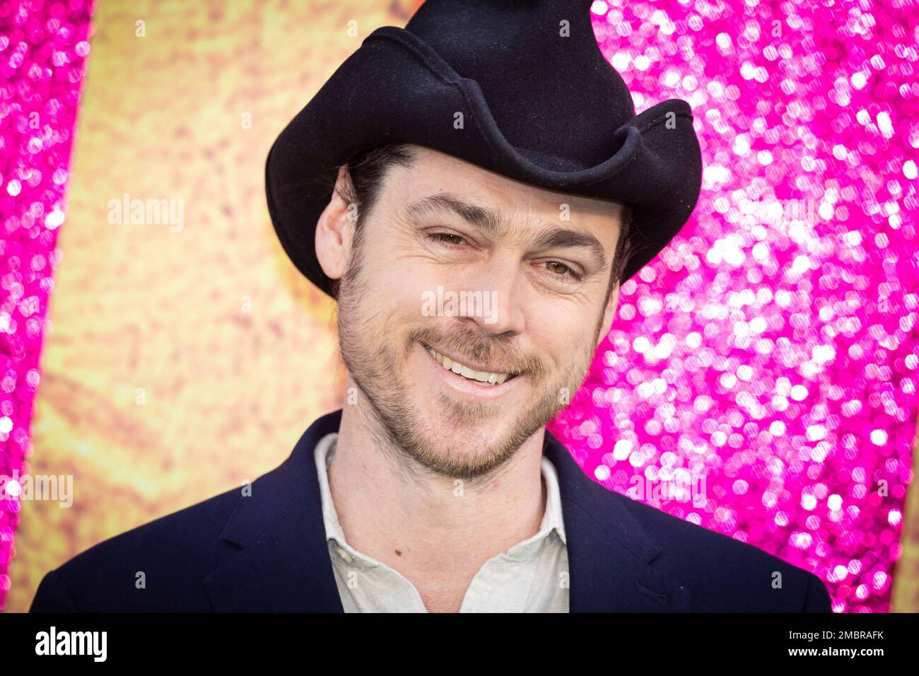 Aaron Nee poses for photographers upon arrival at the premiere of the ...
