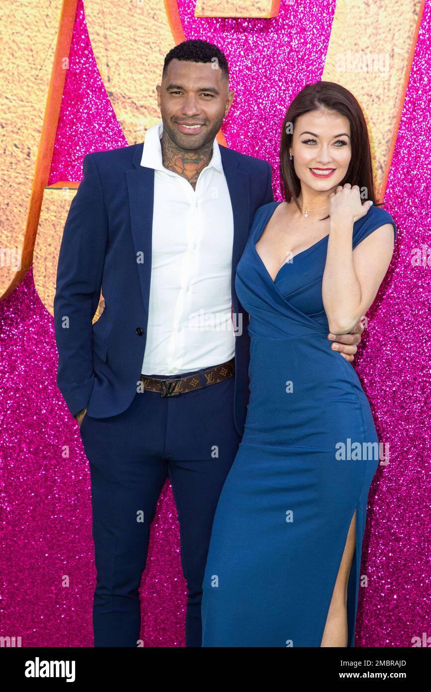 Jermaine Pennant and Jess Impiazzi pose for photographers upon arrival ...