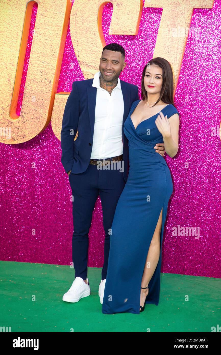 Jermaine Pennant and Jess Impiazzi pose for photographers upon arrival ...