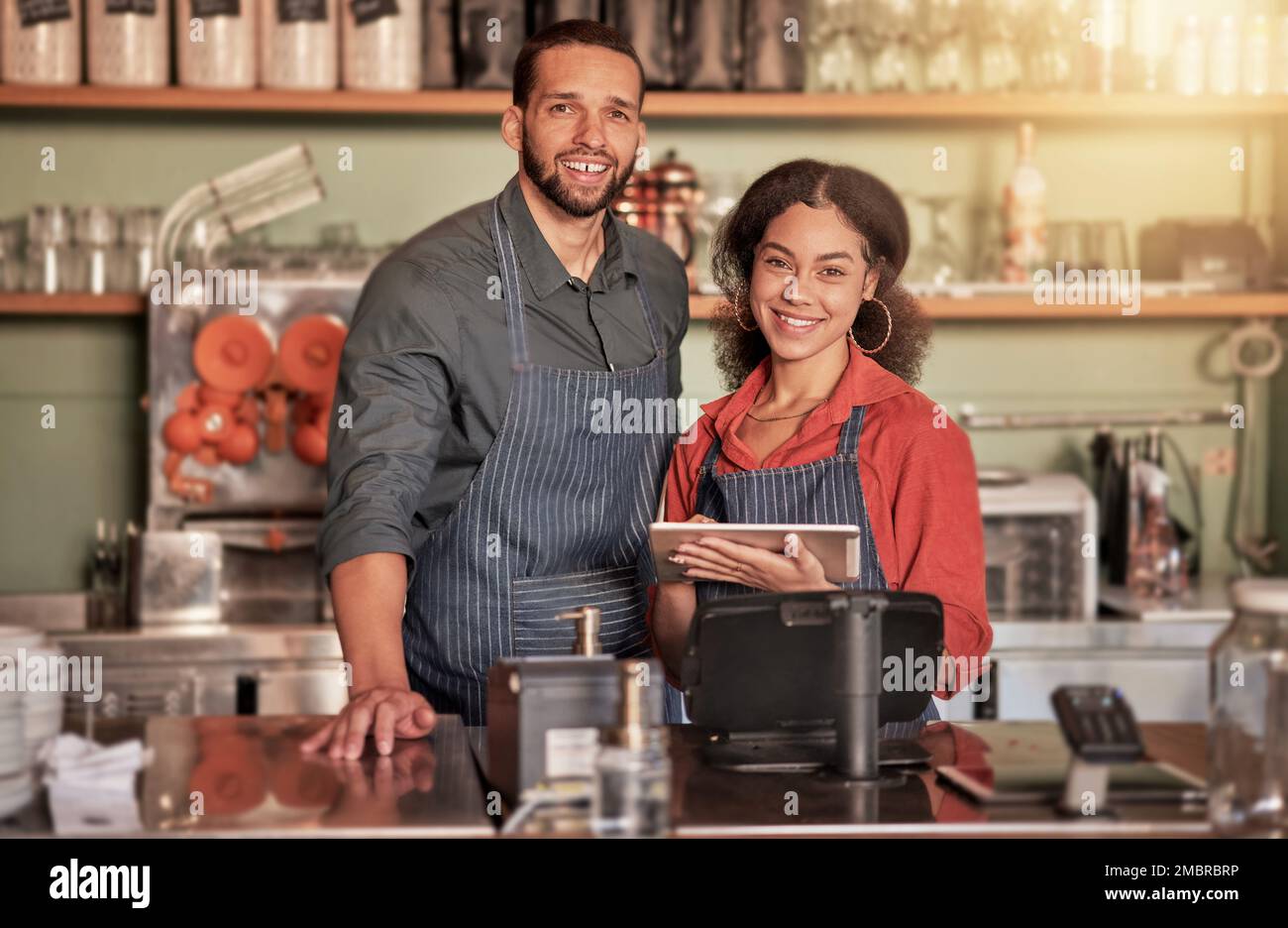 Portrait, cafe and barista couple with tablet ready to take orders in ...