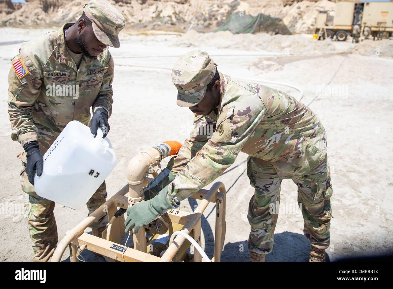 U.S. Army Reserve Spc. Philip Arabambi (left) and Spc. Mubarak Lamina ...