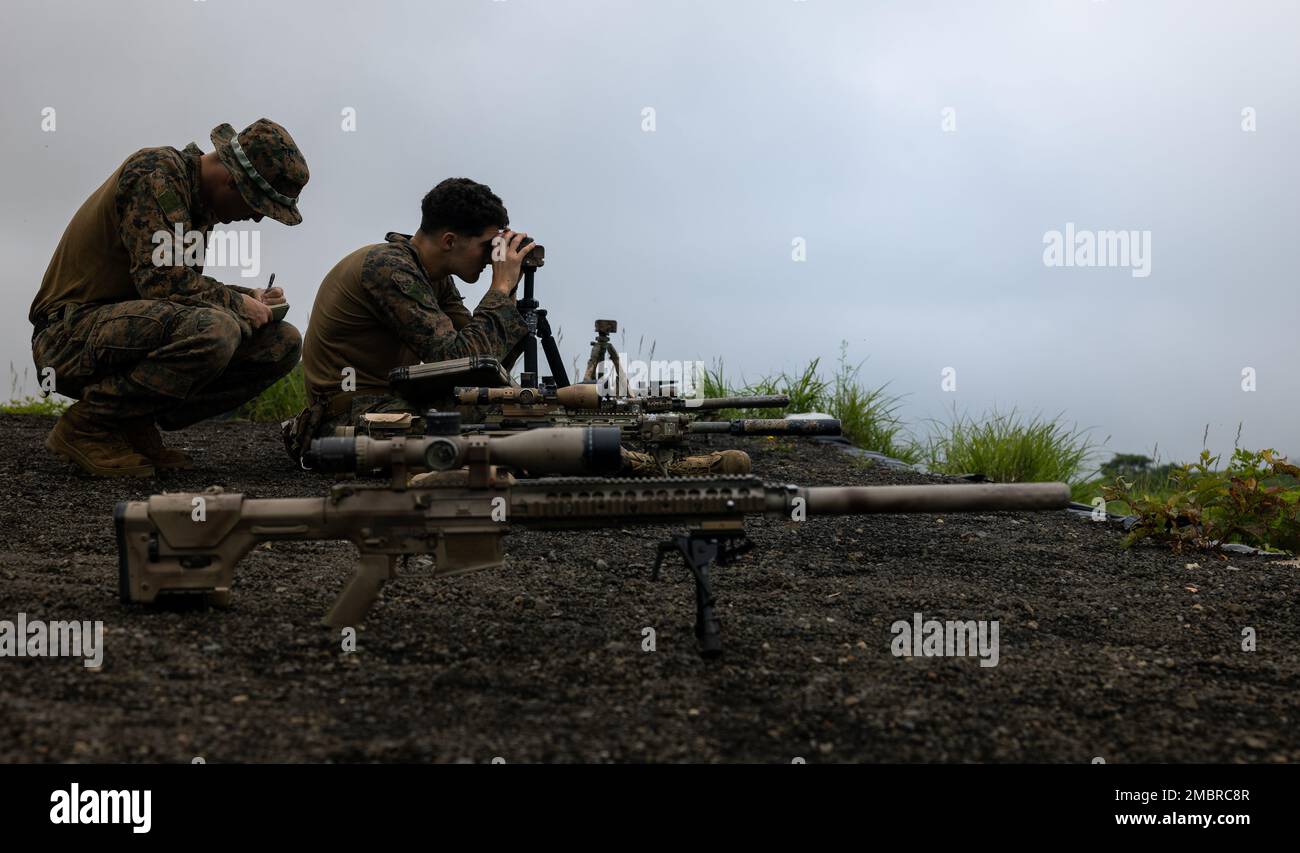U.S. Marines Corps Lance Cpl. David Booth (left) and Cpl. Colin Haley ...