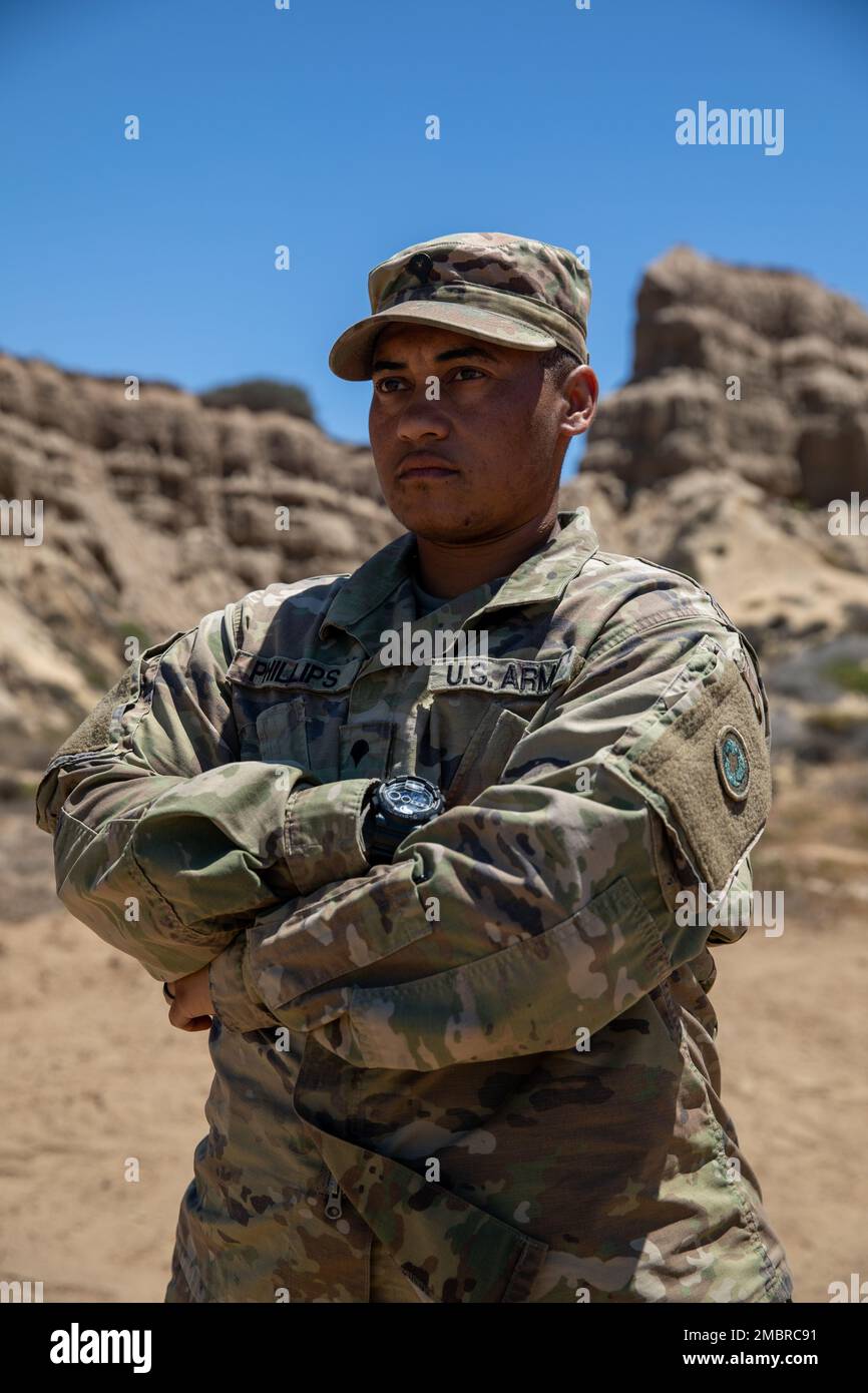 Army Reserve Spc. Leo Phillips, a water treatment specialist assigned ...