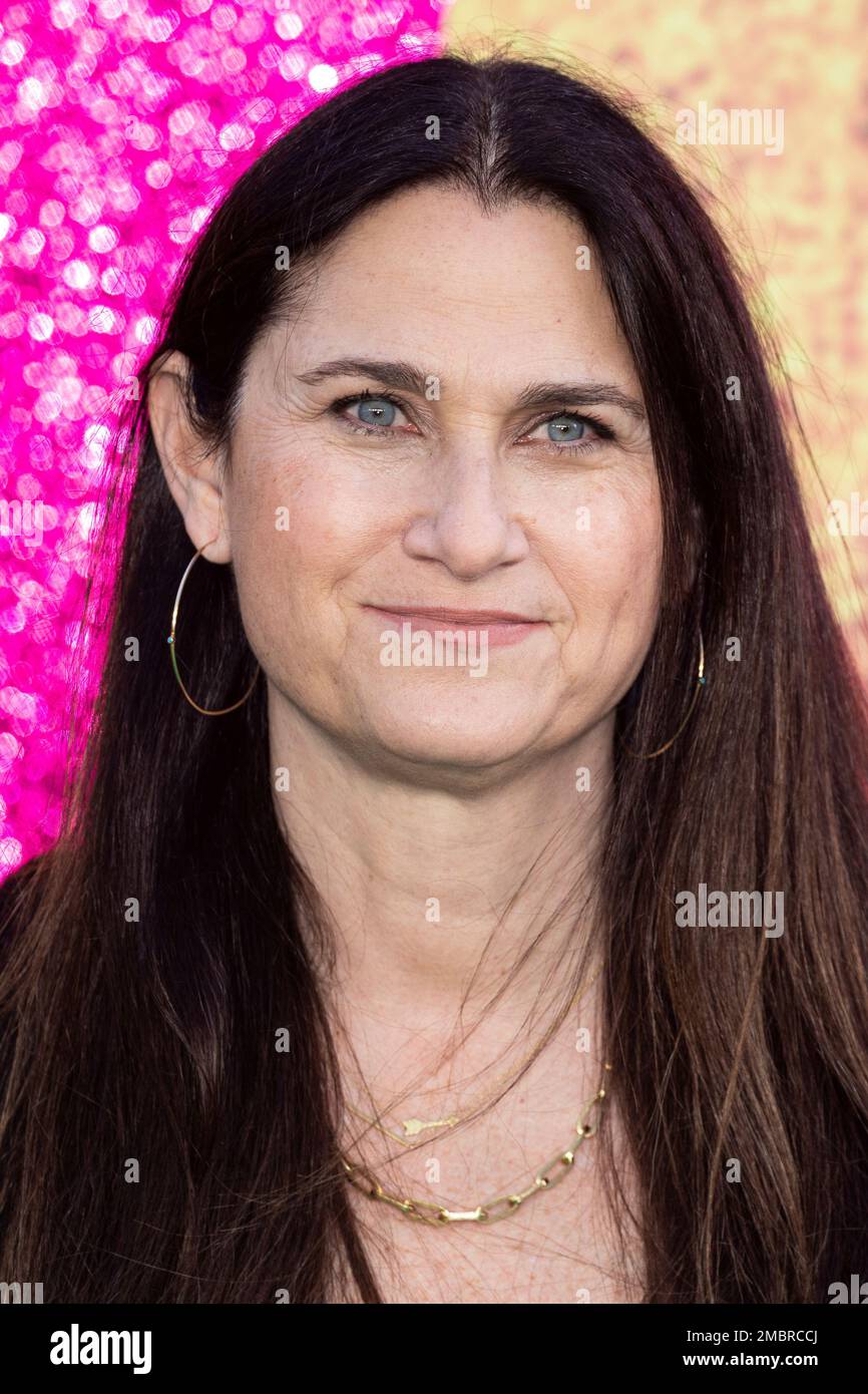 Producer Liza Chasin poses for photographers upon arrival at the ...