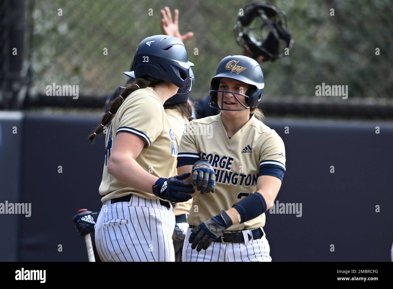 George Washington's Maggie Greco, right, and Taylin Yankovich celebrate ...