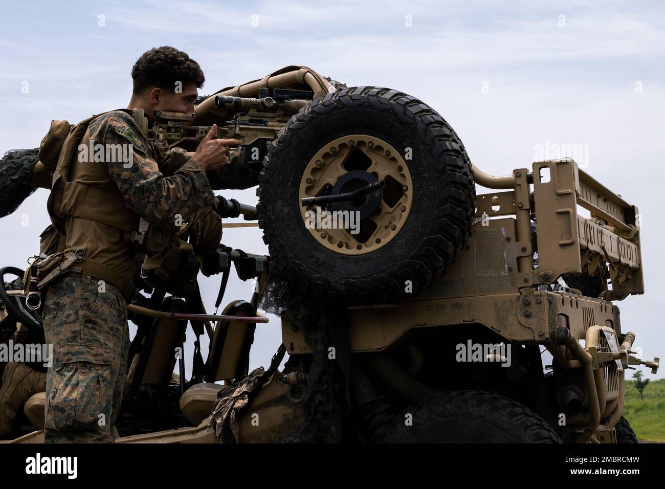 U.S. Marine Corps Cpl. Colin Haley, a scout sniper with 3d Battalion ...