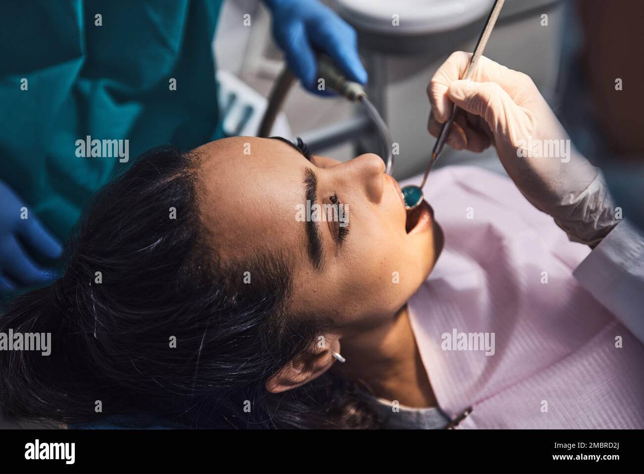 A pain free procedure makes for a satisfied patient. a young woman ...