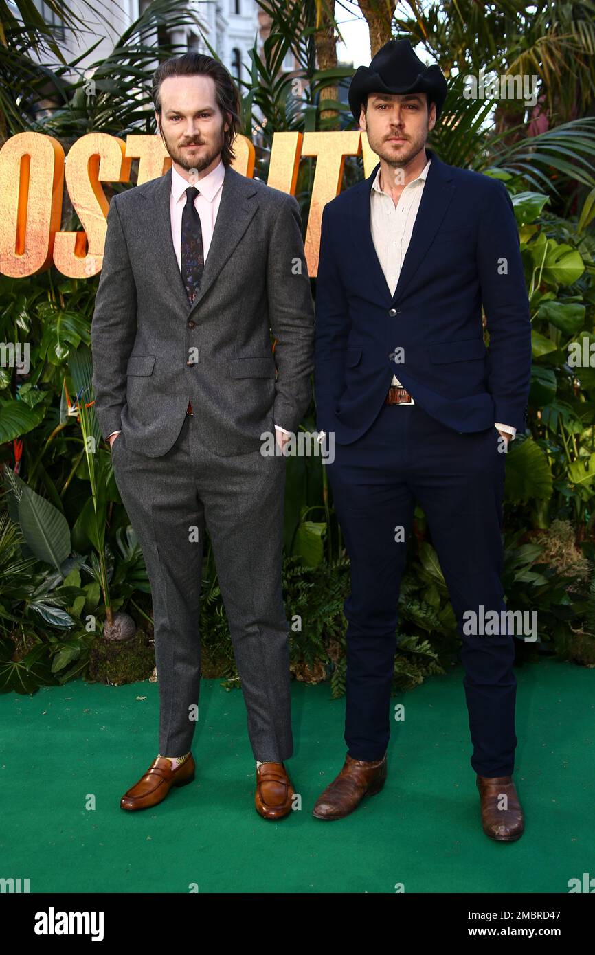 Adam Nee, left, and Aaron Nee pose for photographers upon arrival at ...