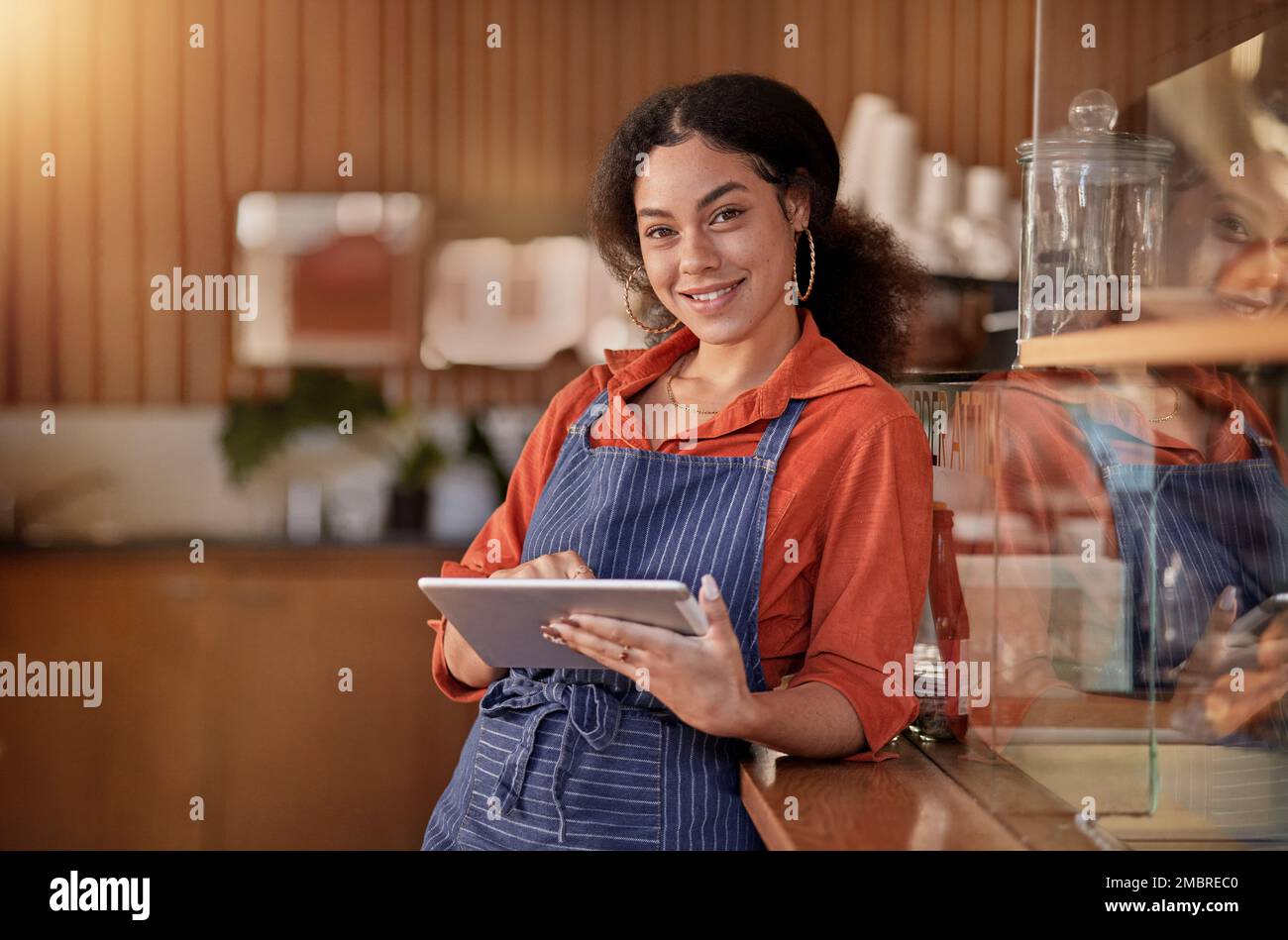 Portrait, cafe waiter and black woman with tablet to manage orders ...