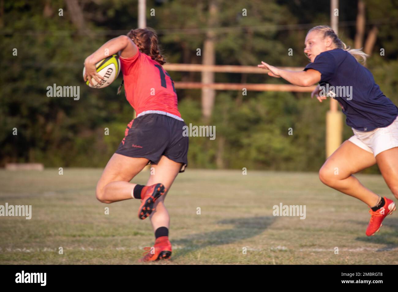 U.S. Marine Lance Cpl. Anastasia Schraff, left, USMC Rugby Team member ...