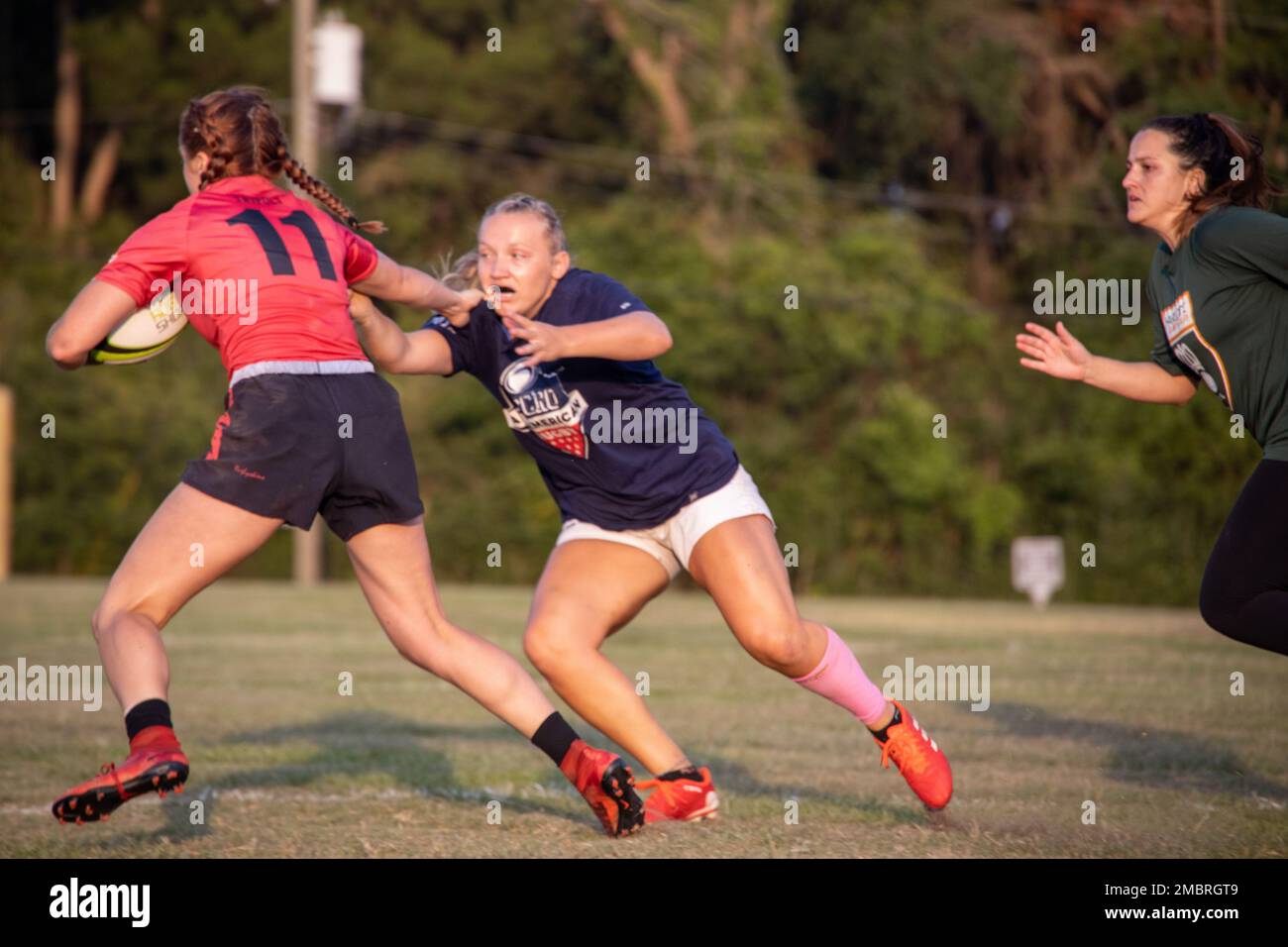 U.S. Marine Lance Cpl. Anastasia Schraff, left, USMC Rugby Team member ...