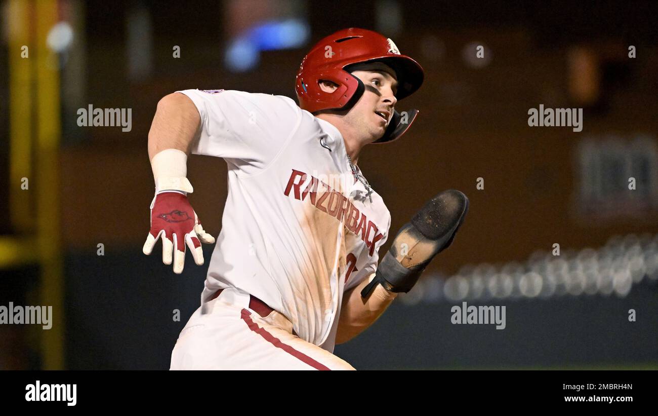 Arkansas baserunner Braydon Webb (24) rounds third base to score ...