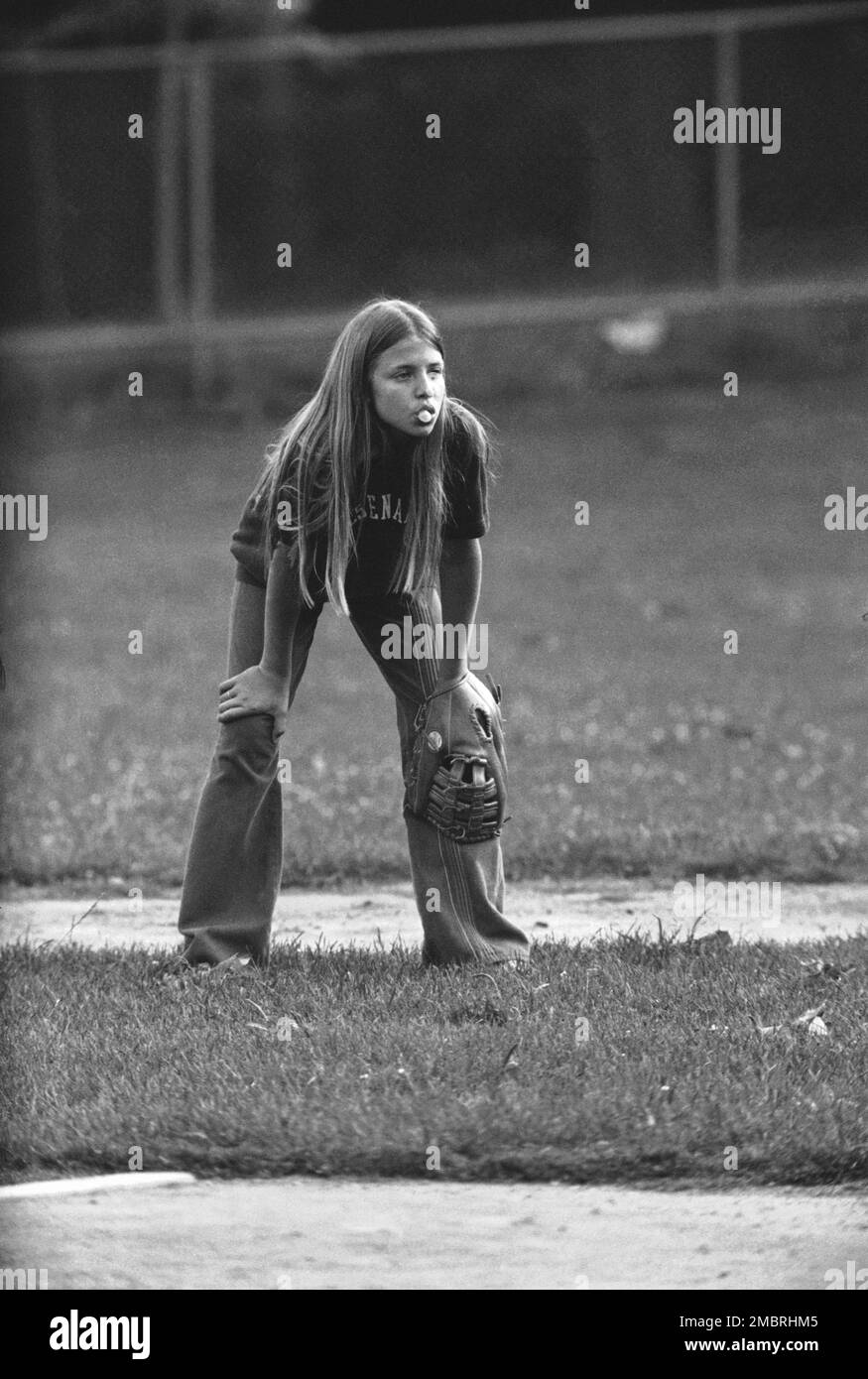 Lauren Torre, daughter of New York Mets manager Joe Torre, blows a bubble during a break in the ...