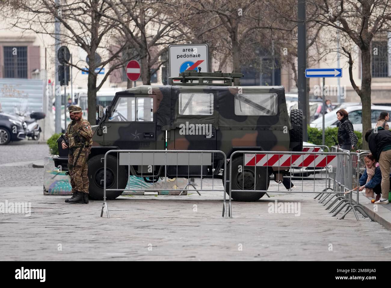 Italian soldiers patrol the Duomo square in Milan, Italy, Wednesday ...