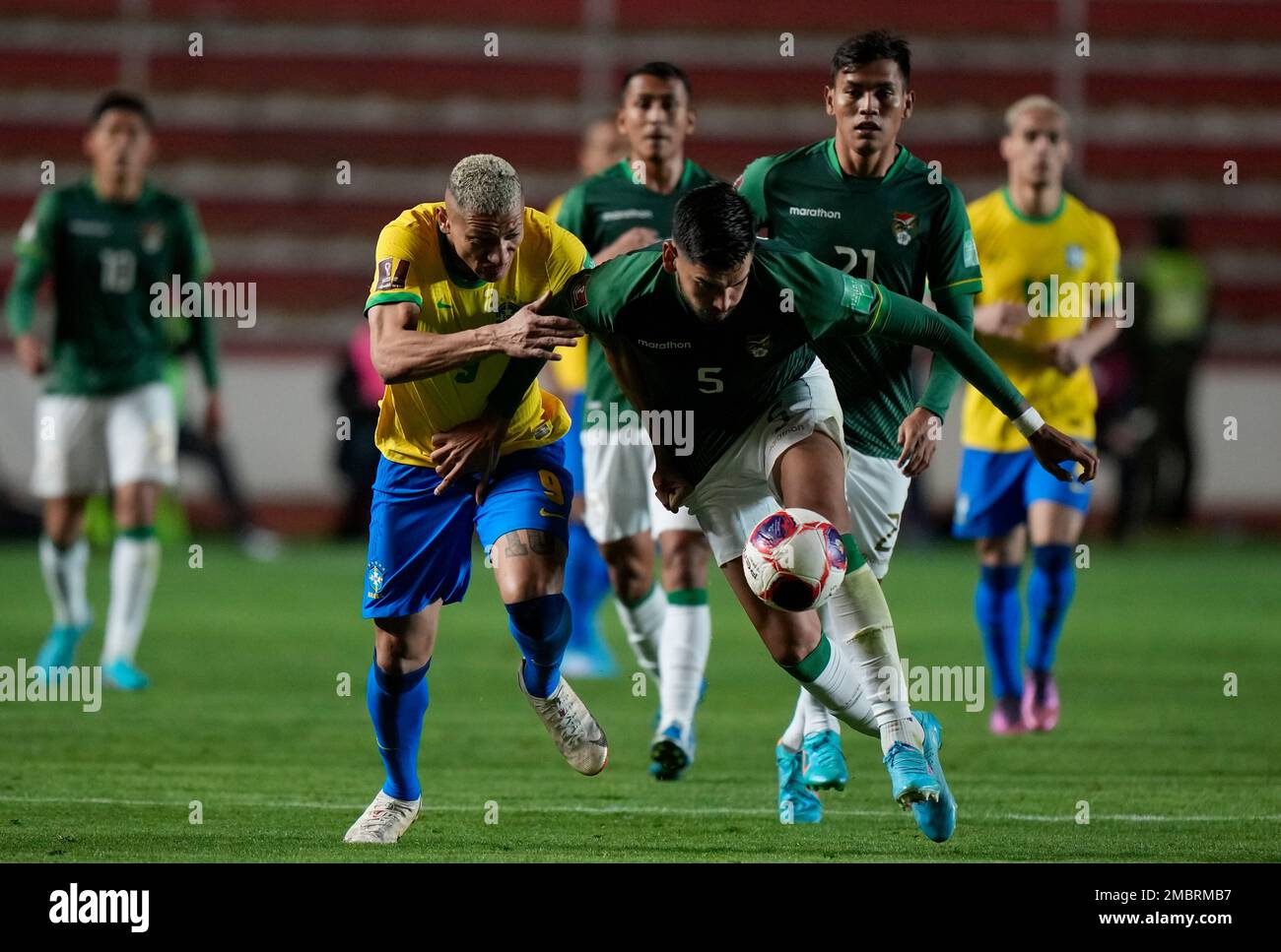 Brazil's Richarlison, left, and Bolivia's Jose Maria Carrasco battle ...