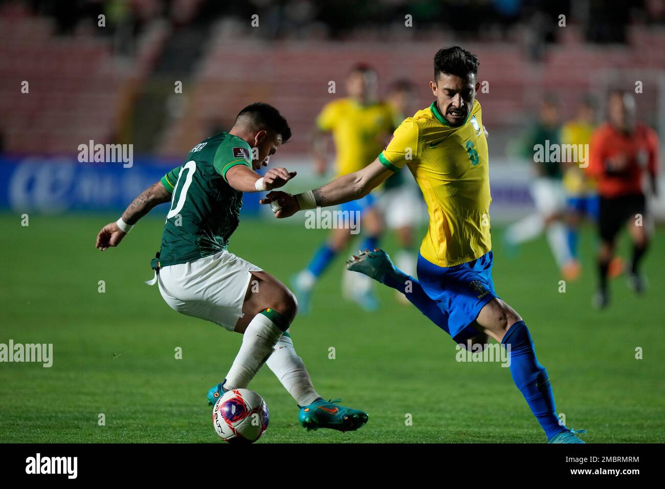 Bolivia's Ramiro Vaca, left, and Brazil's Alex Telles battle for the ...