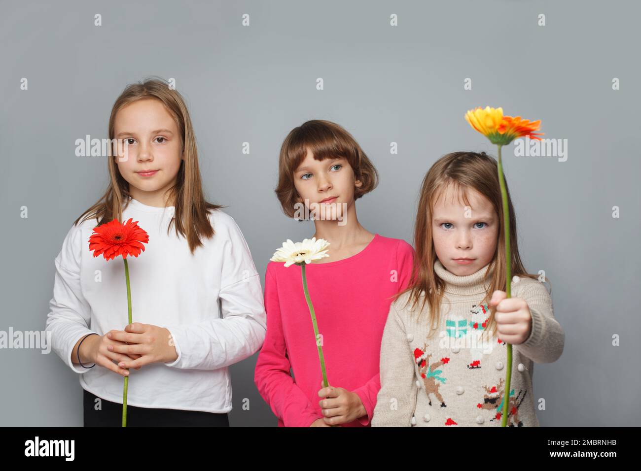 Funny kid holding bouquet flowers hi-res stock photography and images ...