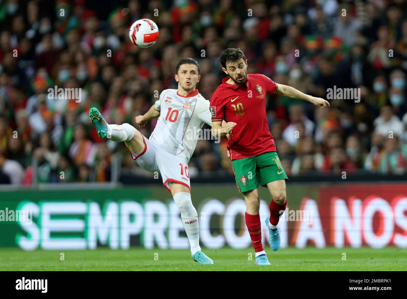 North Macedonia's Enis Bardi controls the ball next to Portugal's ...
