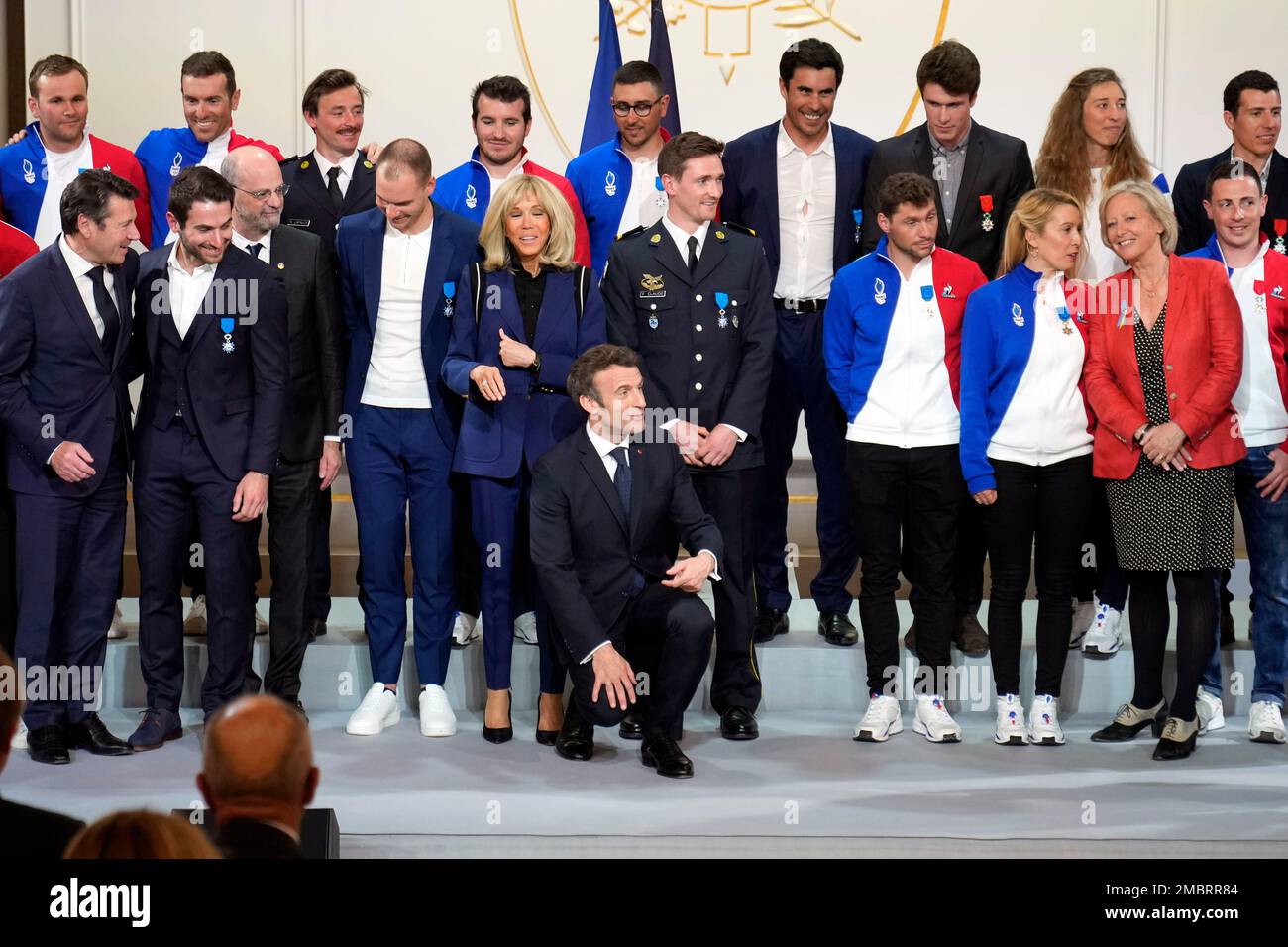 French President Emmanuel Macron, center, and his wife Brigitte Macron ...