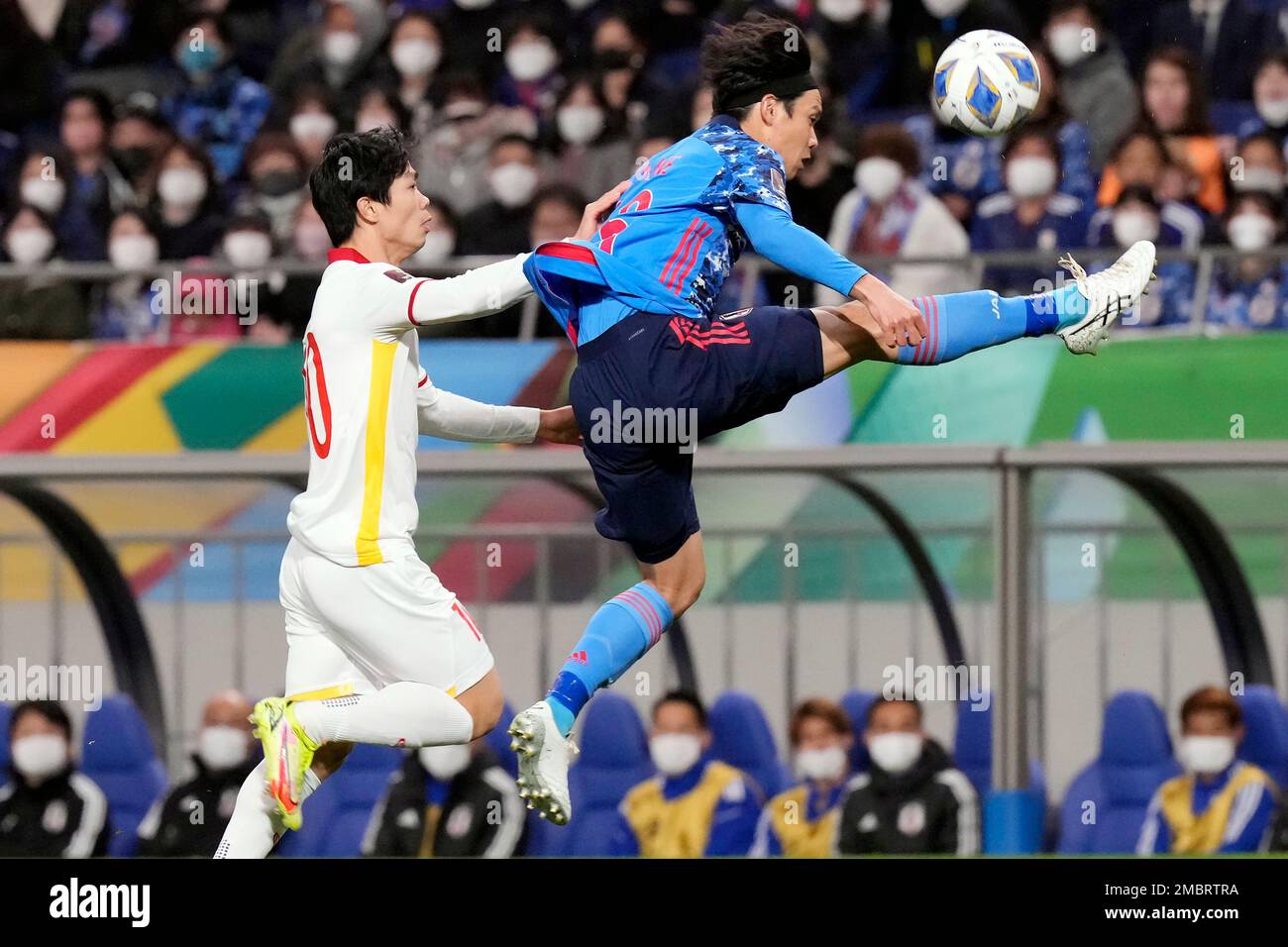 Japan's Miki Yamane, right, and Vietnam's Nguyen Cong Phuong fight for the ball during the World ...